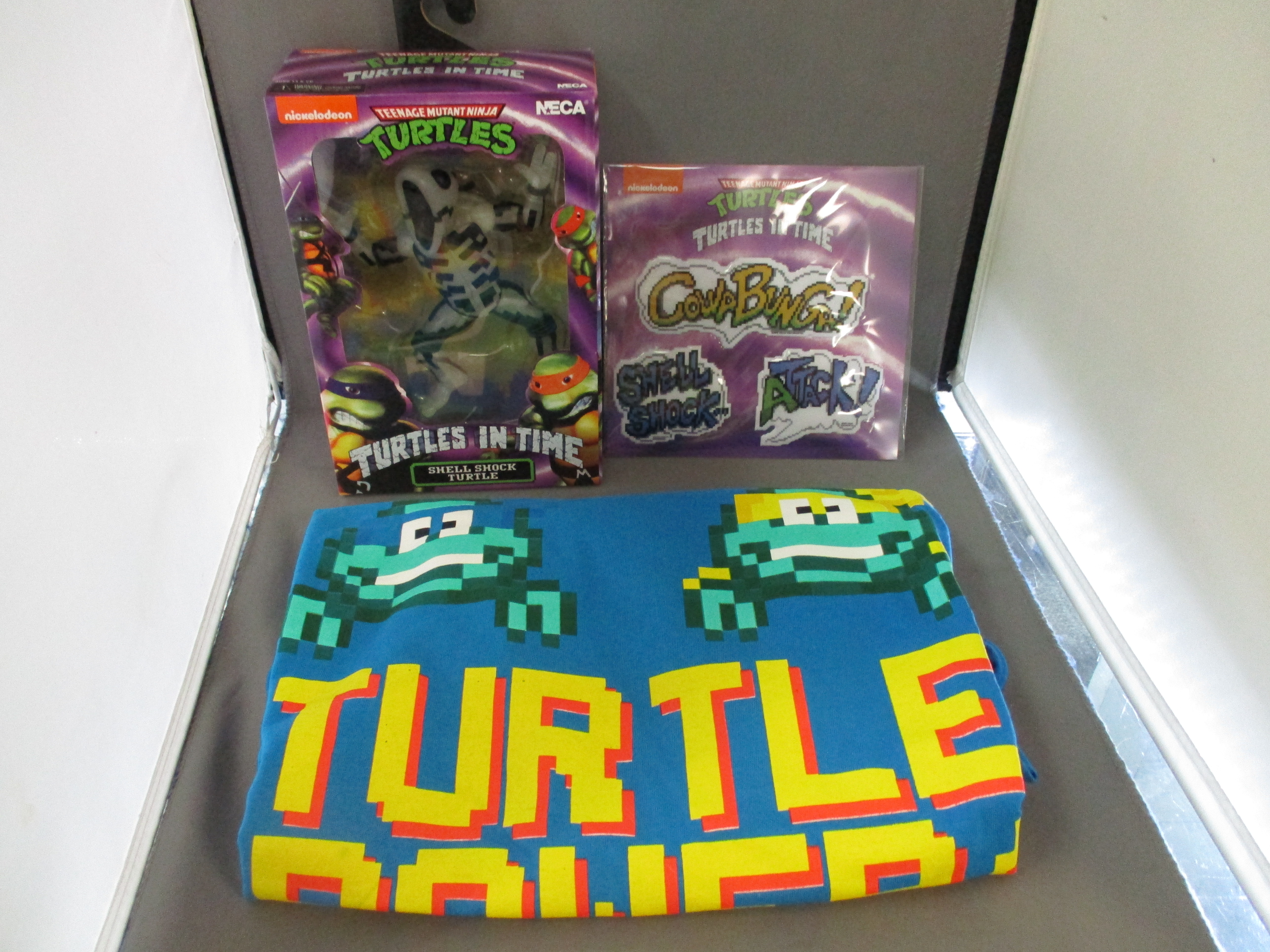 Neca Tmnt Shell Shock Turtle W/ Shirt & Stickers – Crowemag Toys
